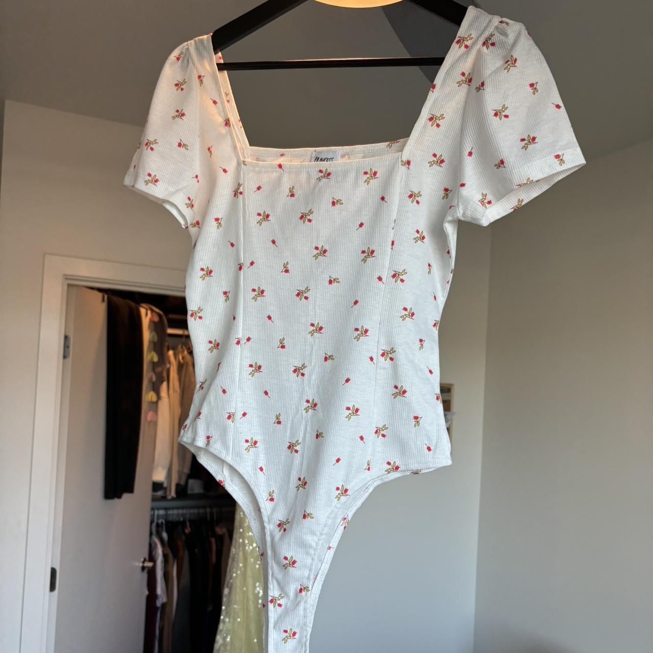 snap bodysuit, with thong style back. never worn!... - Depop