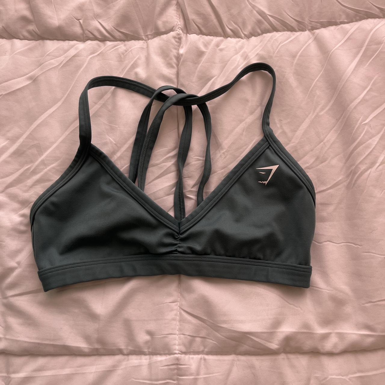 Gymshark minimal sports bra green size xs Tag cut... - Depop