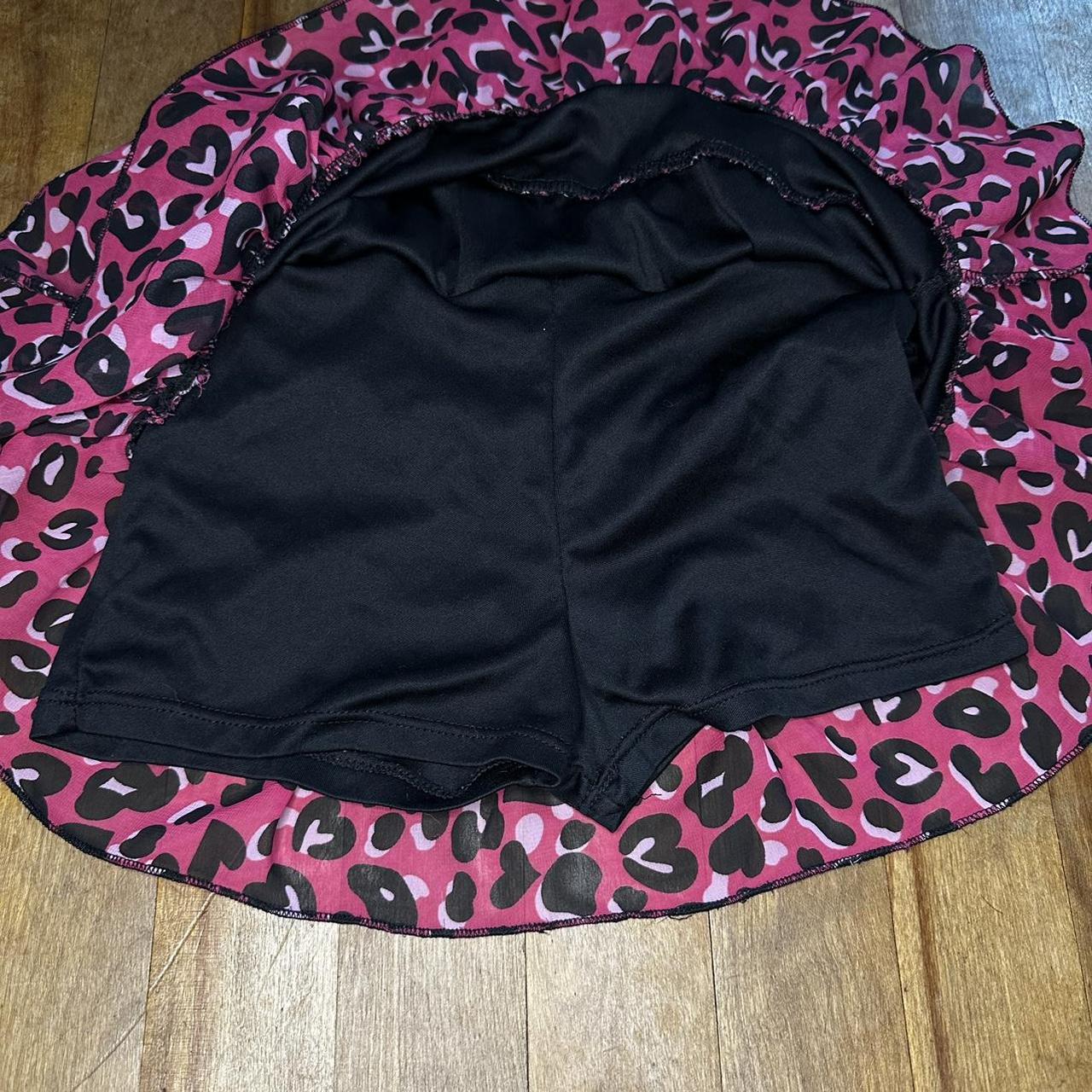 Y2K pink leopard print mini skirt. Cute ruffles, and... - Depop
