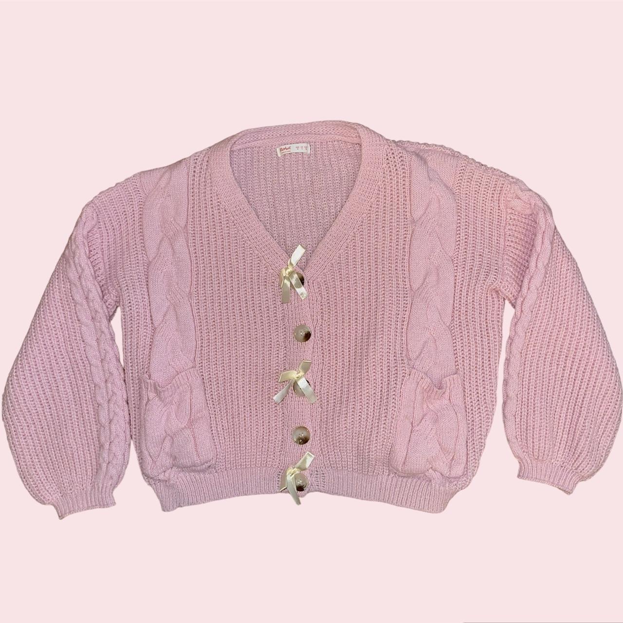 Pink coquette cardigan. Cardigan has bow and pockets... - Depop