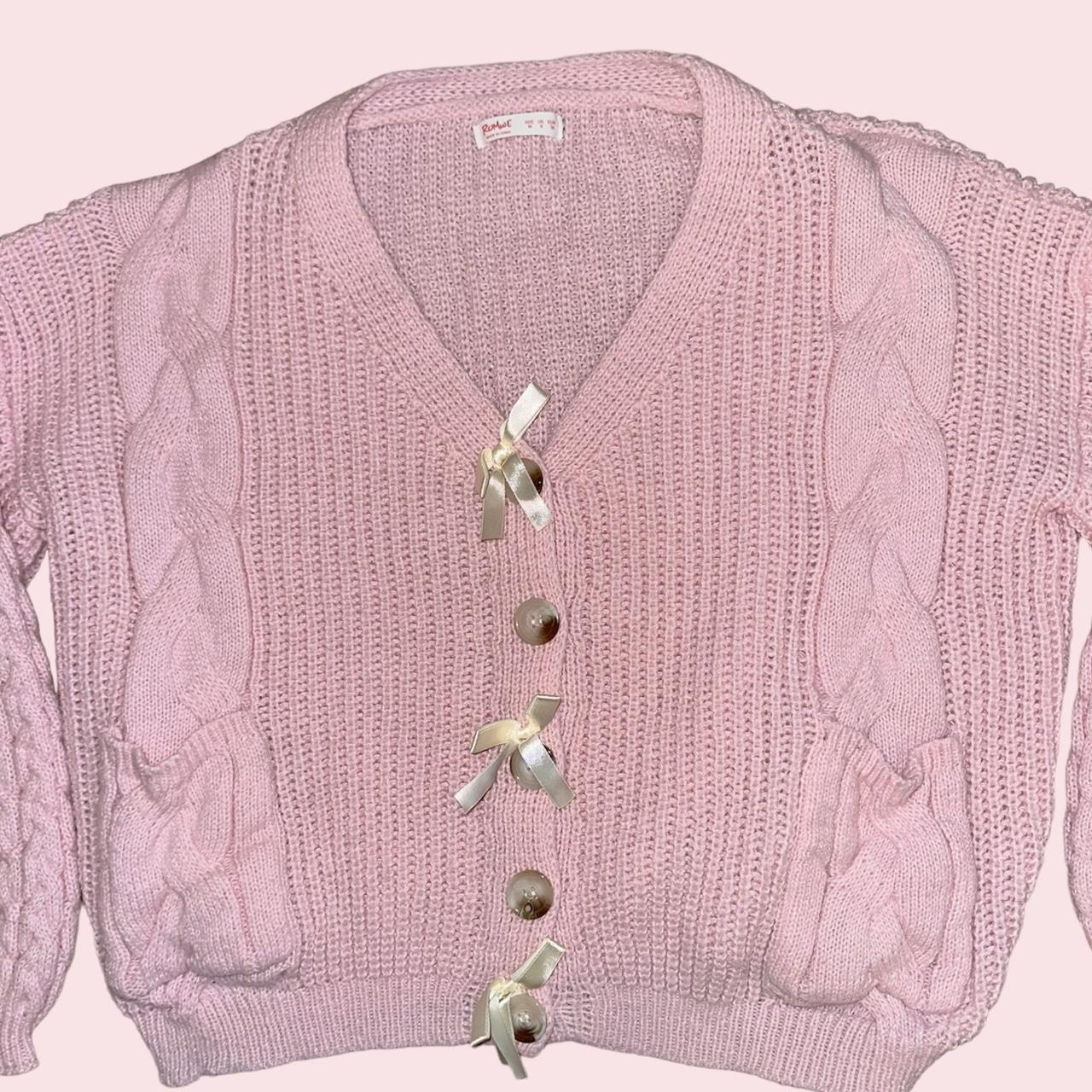 Pink coquette cardigan. Cardigan has bow and pockets... - Depop