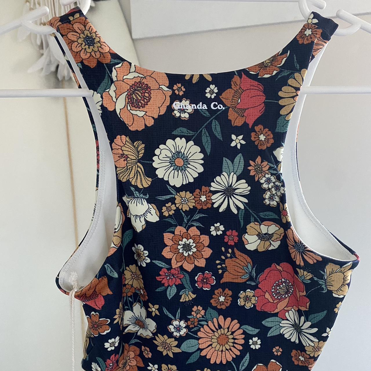 Floral yoga tank from Ghanda. It is a size xs, and... - Depop