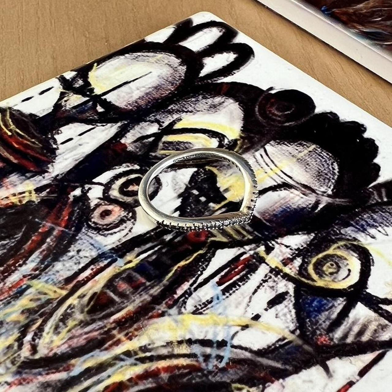 Silver Pandora v shaped ring - cubic zirconia... - Depop