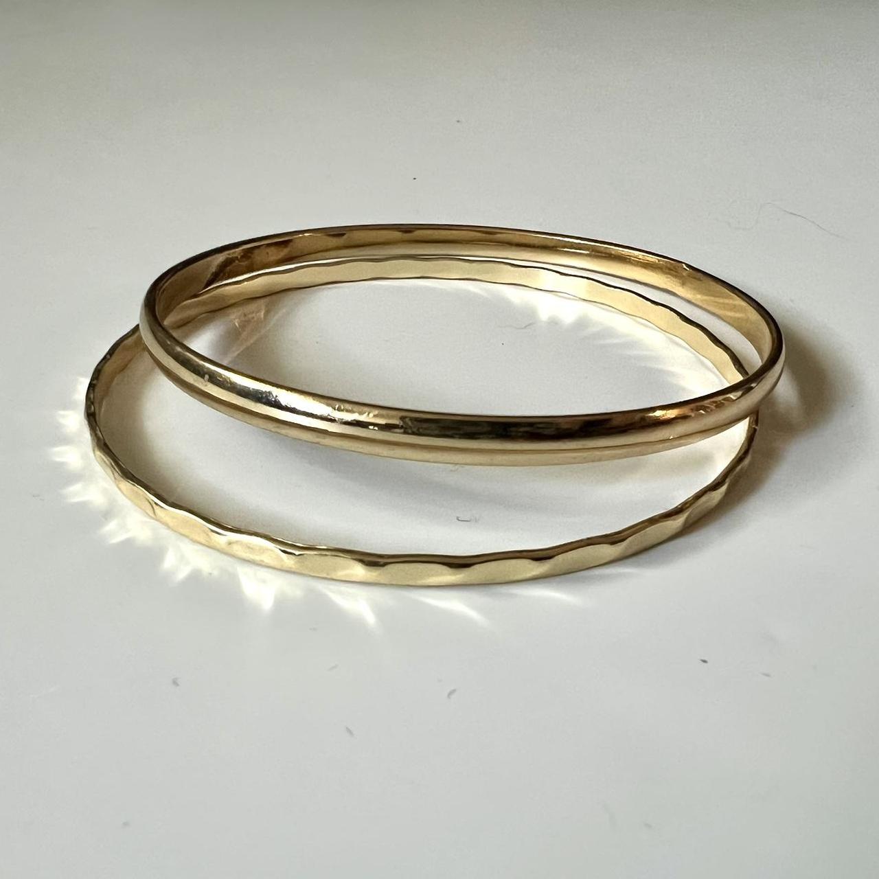 Set of two gold bangles - Depop