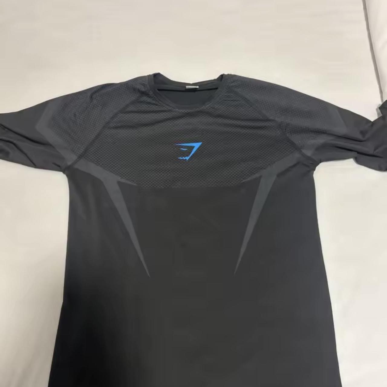 Gymshark black & blue long sleeve compression... | Depop