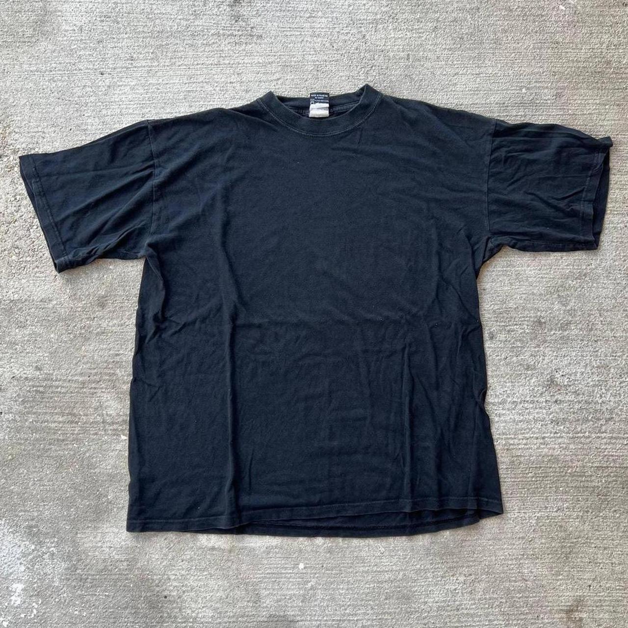 Vintage black blank t shirt. Measures 23.5x29.... - Depop