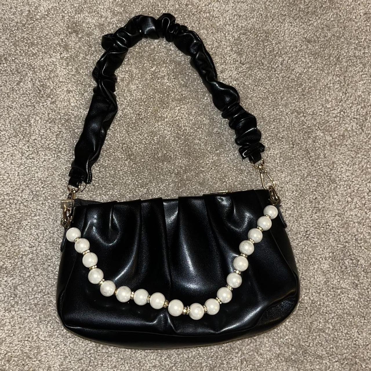black purse with ruched detailing and long pearl... - Depop