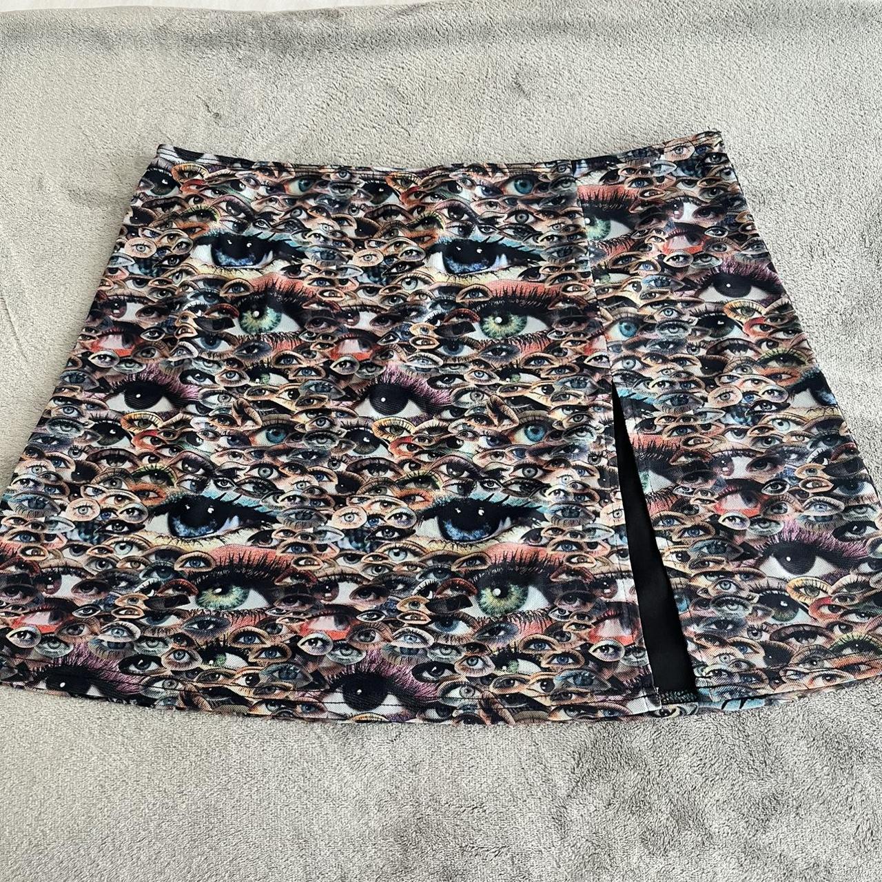 Dollskill trippy eye mini skirt with slit | Size 2X... - Depop