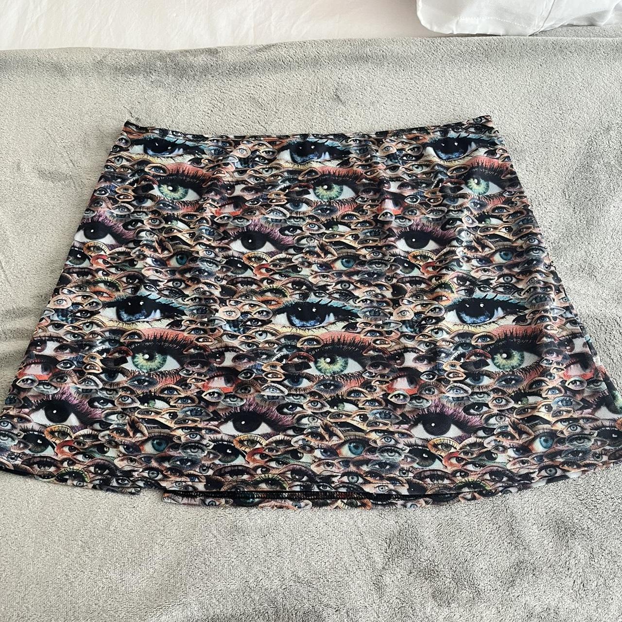 Dollskill trippy eye mini skirt with slit | Size 2X... - Depop