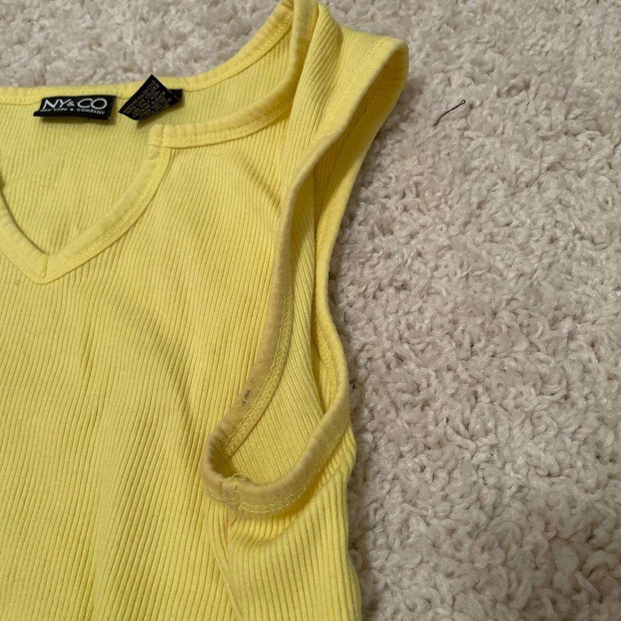 yellow ribbed cut off tank top with notch detail.... - Depop
