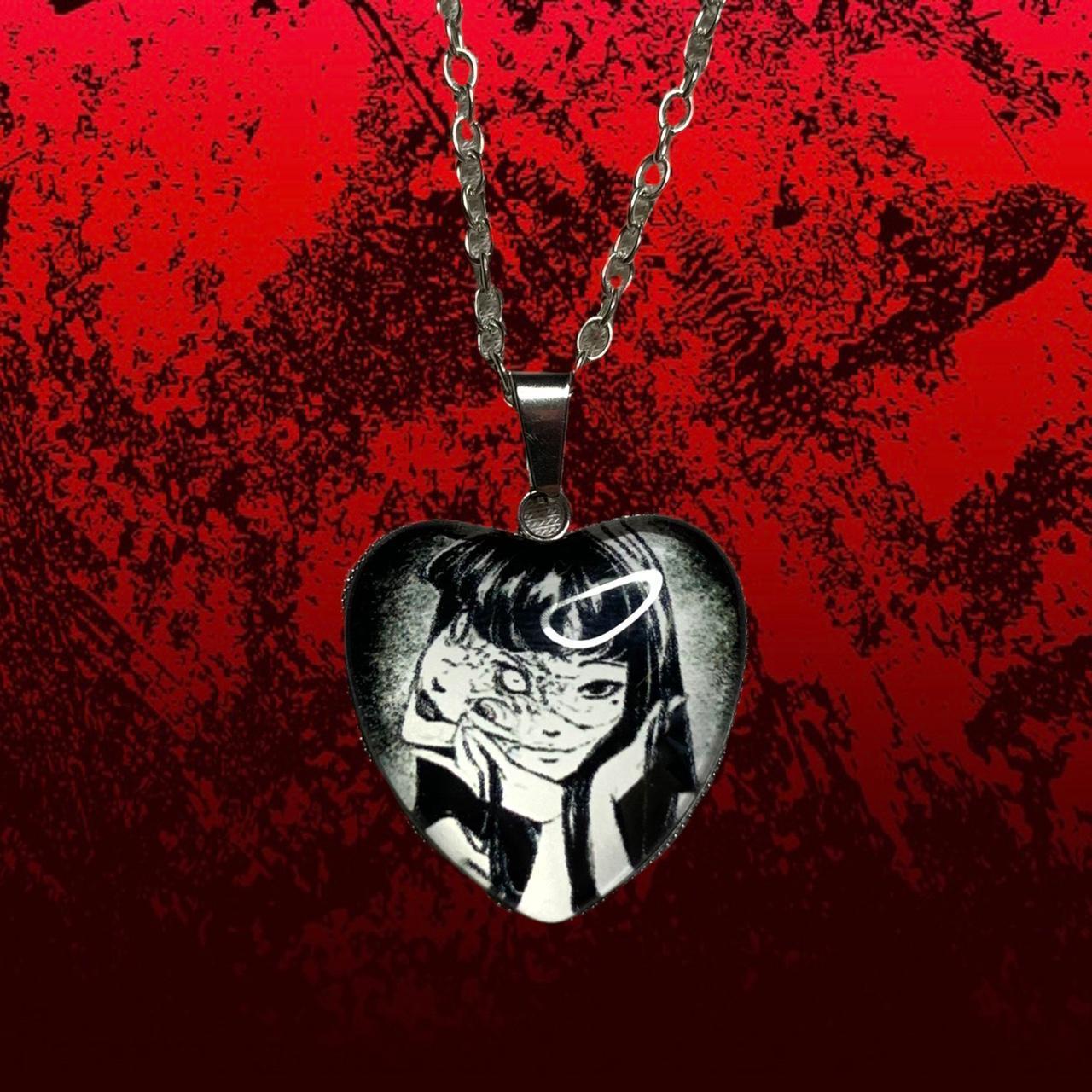 Junji ito tomie split face pendant FREE SHIPPING... - Depop