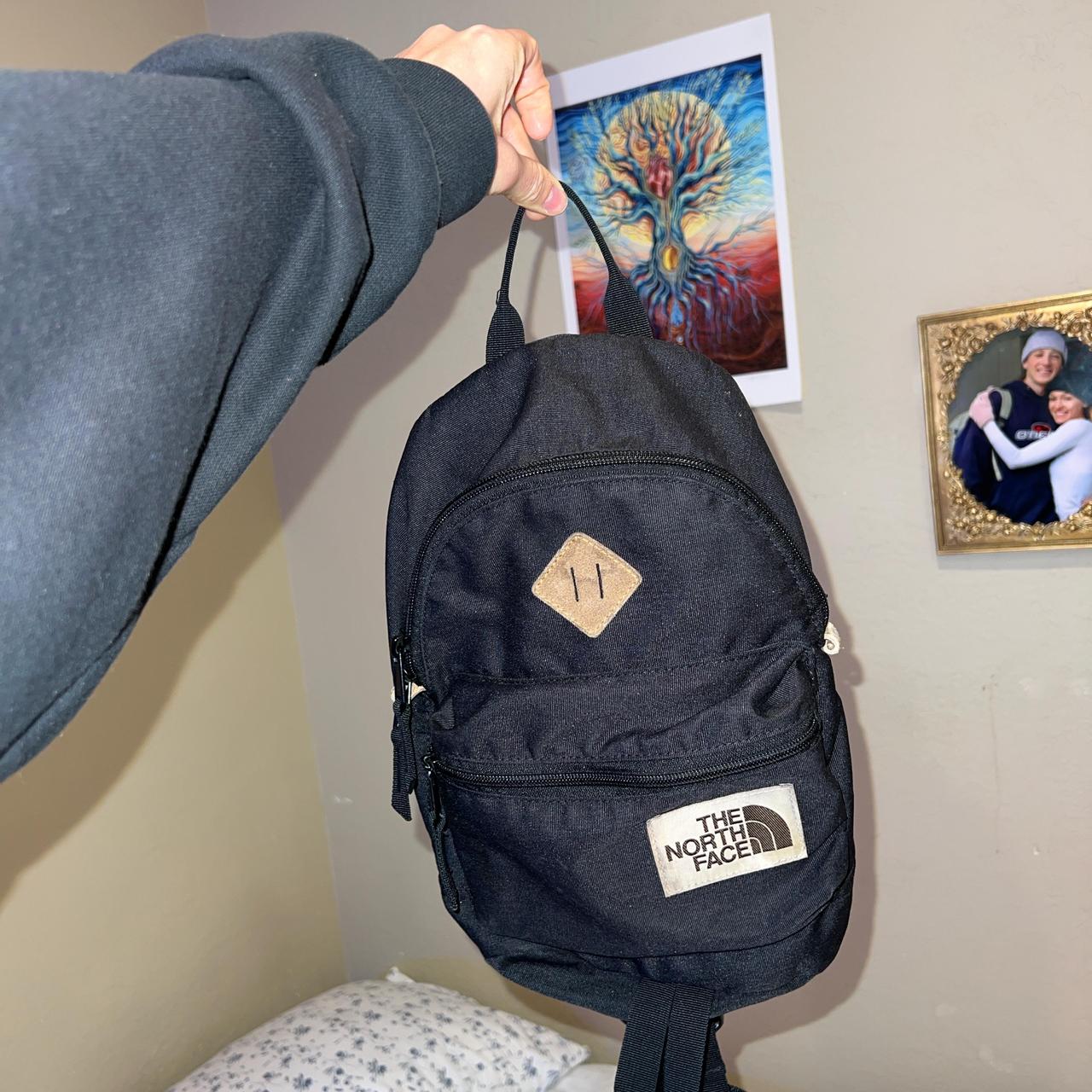 The North Face black and tan MINI backpack. Love... - Depop