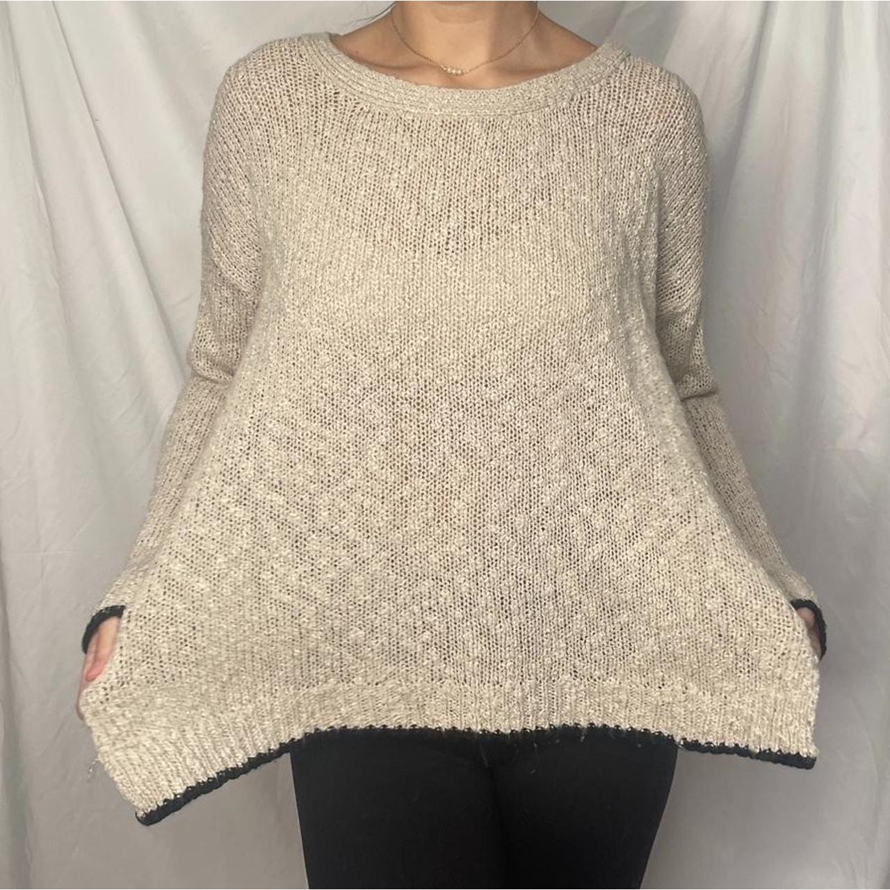 lush neutral tan and black sweater with side slits... - Depop