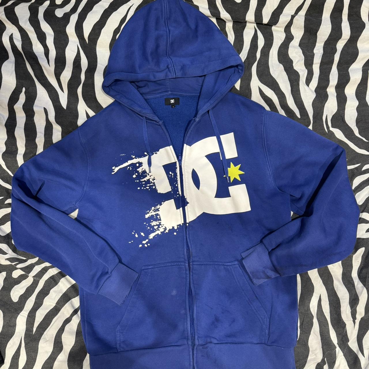 Blue DC hoodie says S but fits more like a M free... - Depop