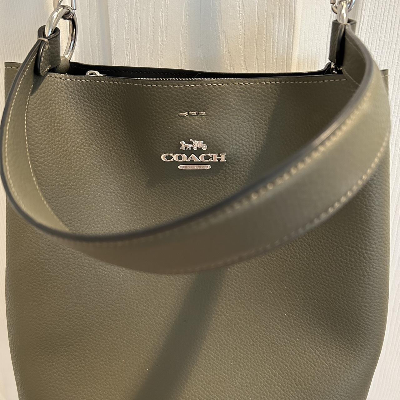 Olive green Coach bucket bag with silver hardware.... - Depop
