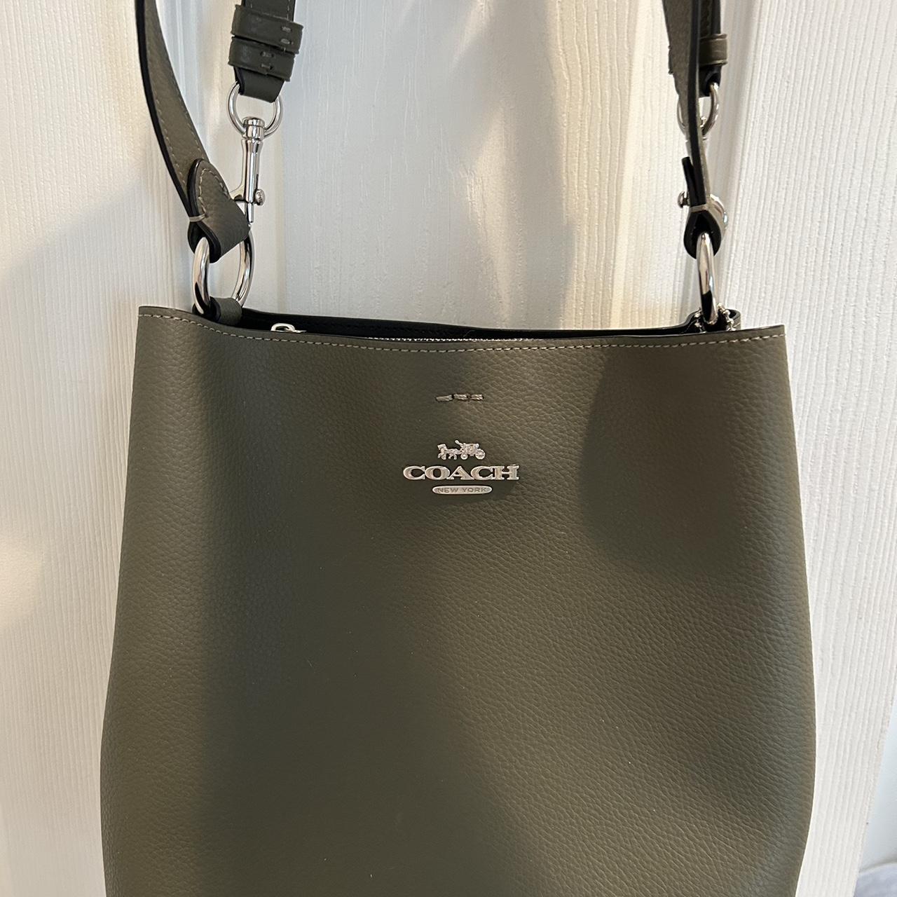 Olive green Coach bucket bag with silver hardware.... - Depop