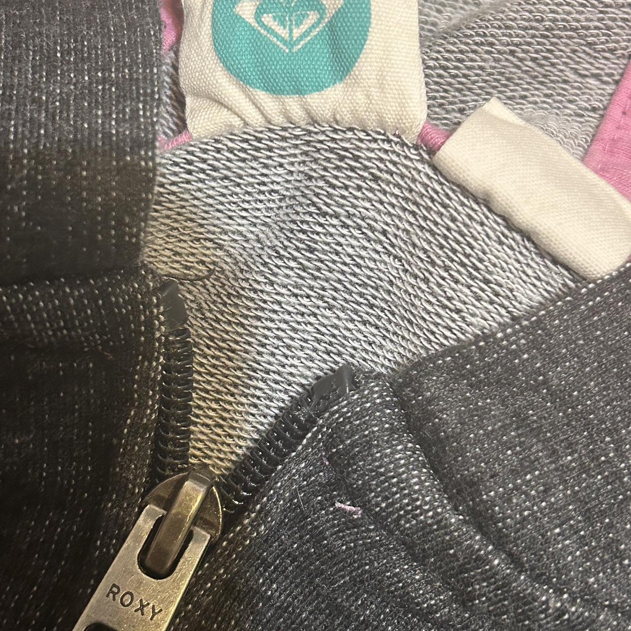 Roxy grey hoodie with pink flowers, featuring a... - Depop