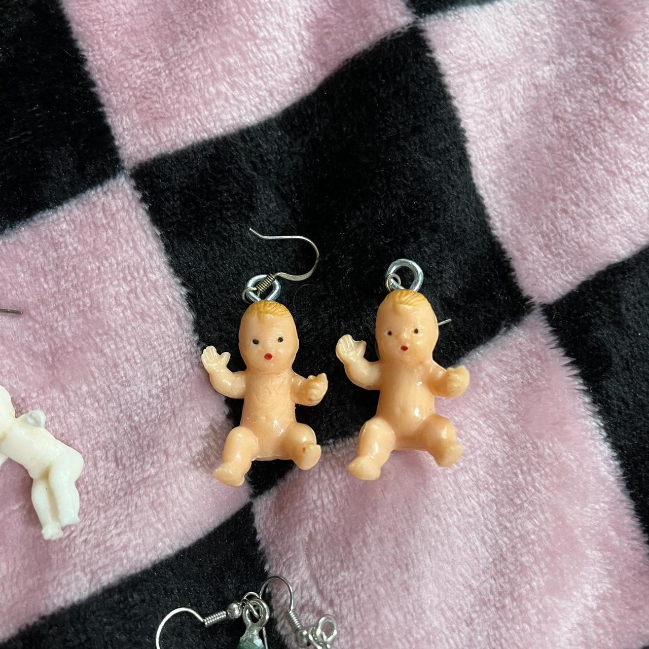 3 sets of “weird core” earrings! 2 baby sets and a... - Depop