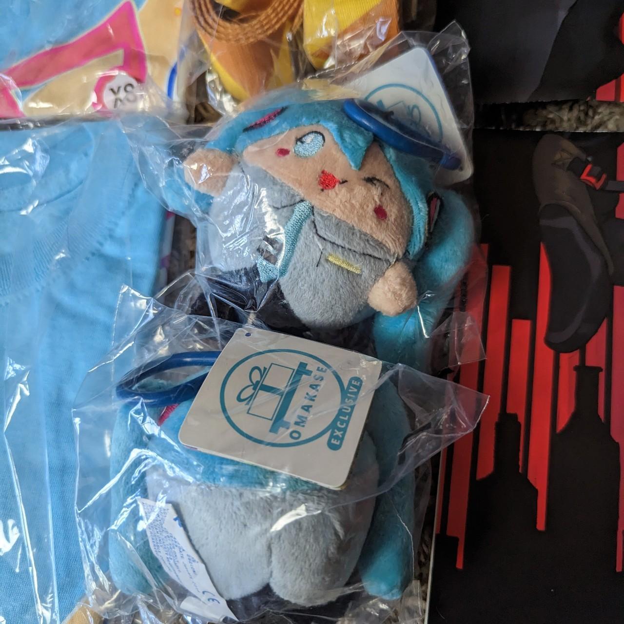 HATSUNE MIKU VOCALOID MERCHANDISE SET. TWO OF... - Depop