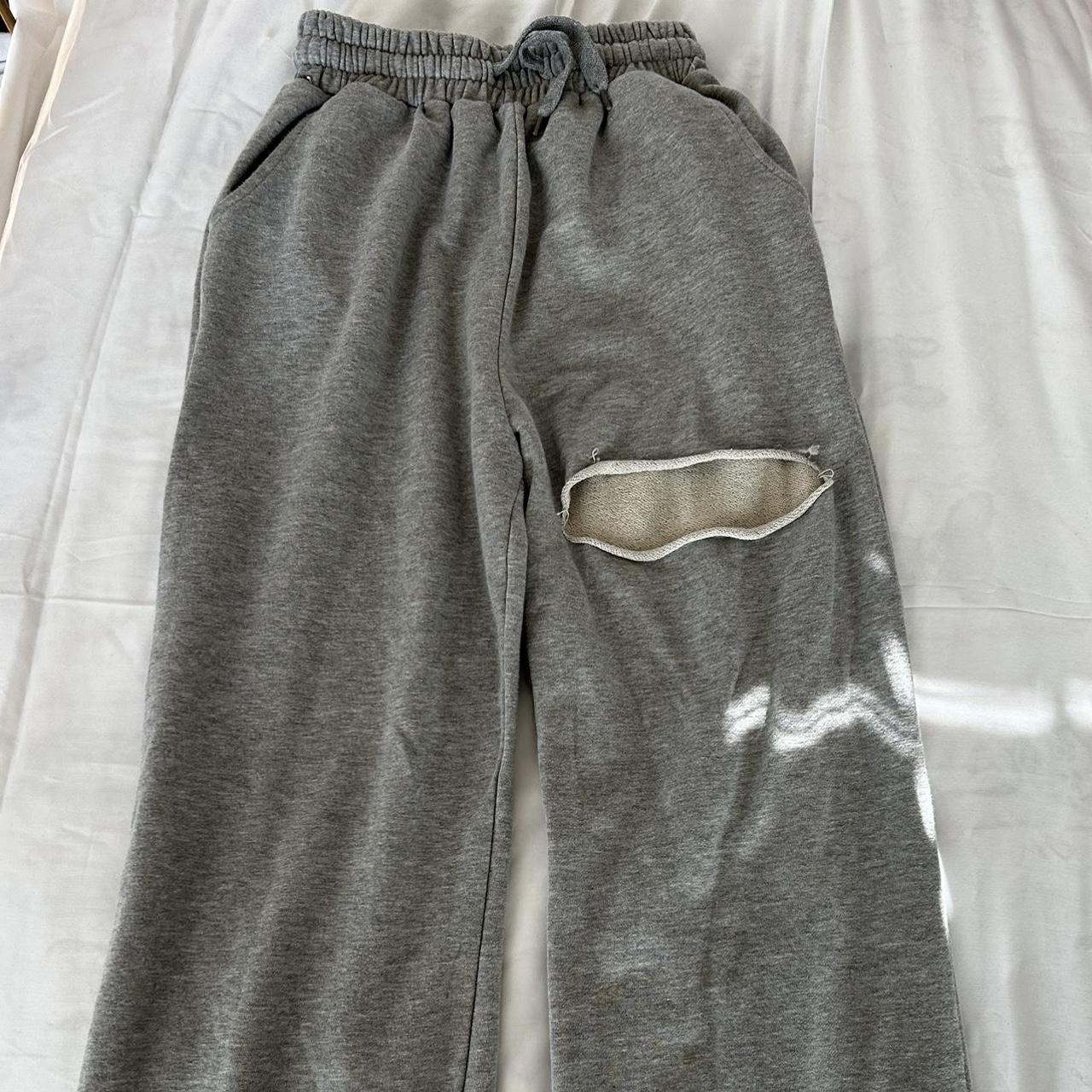 Grey sweatpants with distressed detail DEPOP... - Depop
