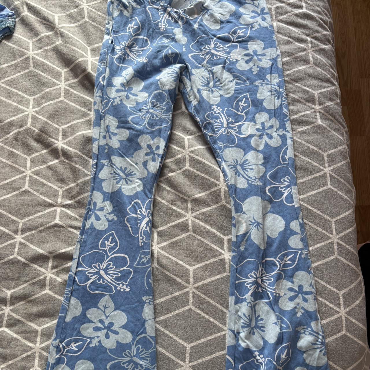 Primark blue floral flares - size 10/12 - worn a few... | Depop
