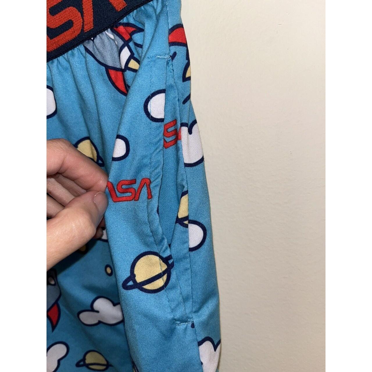 Madengine Mens NASA Spaceship Rocket Jam Shorts... - Depop