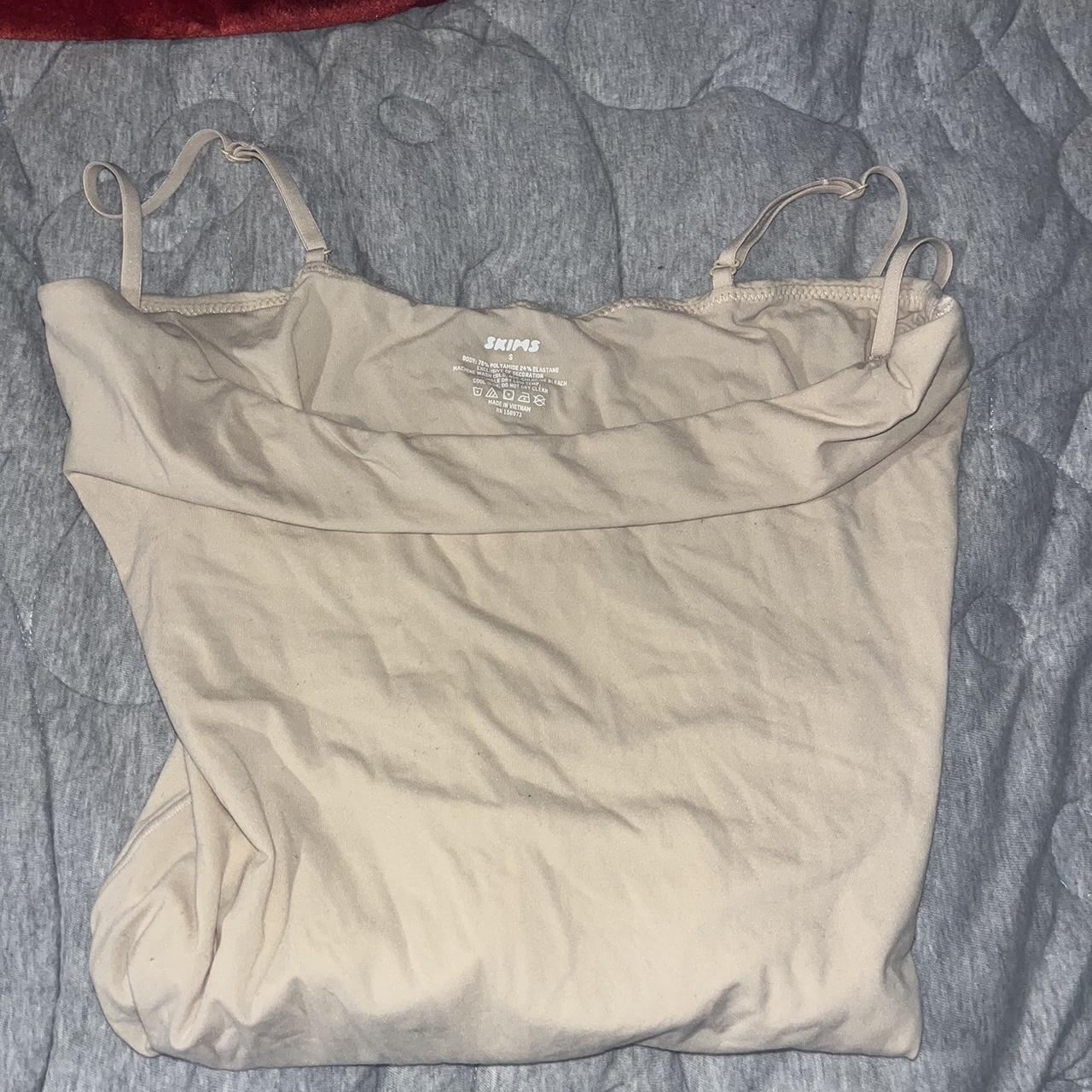 Skims bodysuit in a size small and cream color.... - Depop