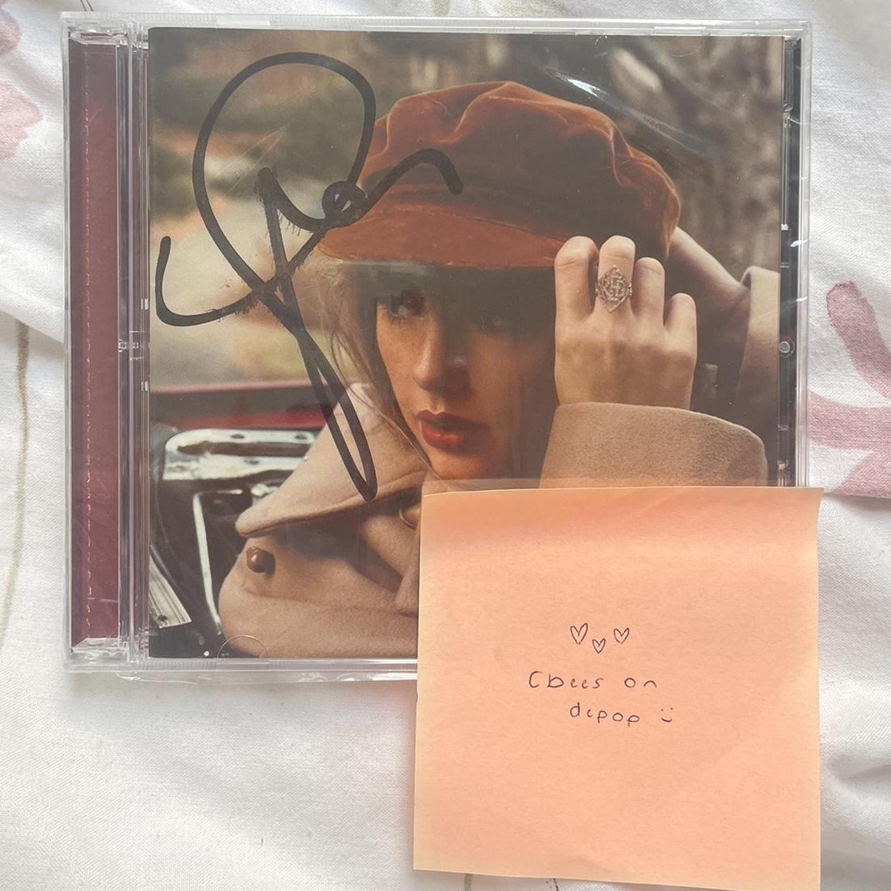 sealed taylor swift red signed cd slight smudging... - Depop