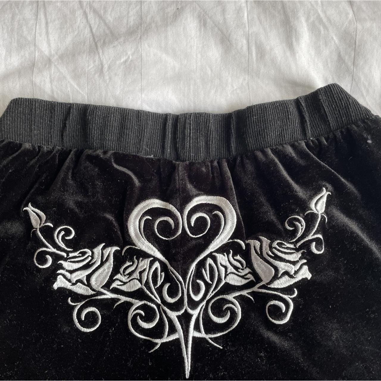 black low-waisted velour tracksuit bottoms with... - Depop