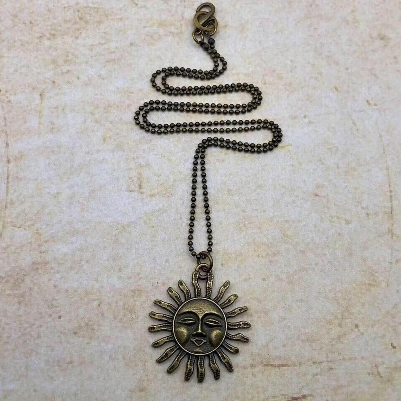 Smiling sun metal pendant necklace. The sun is about... - Depop