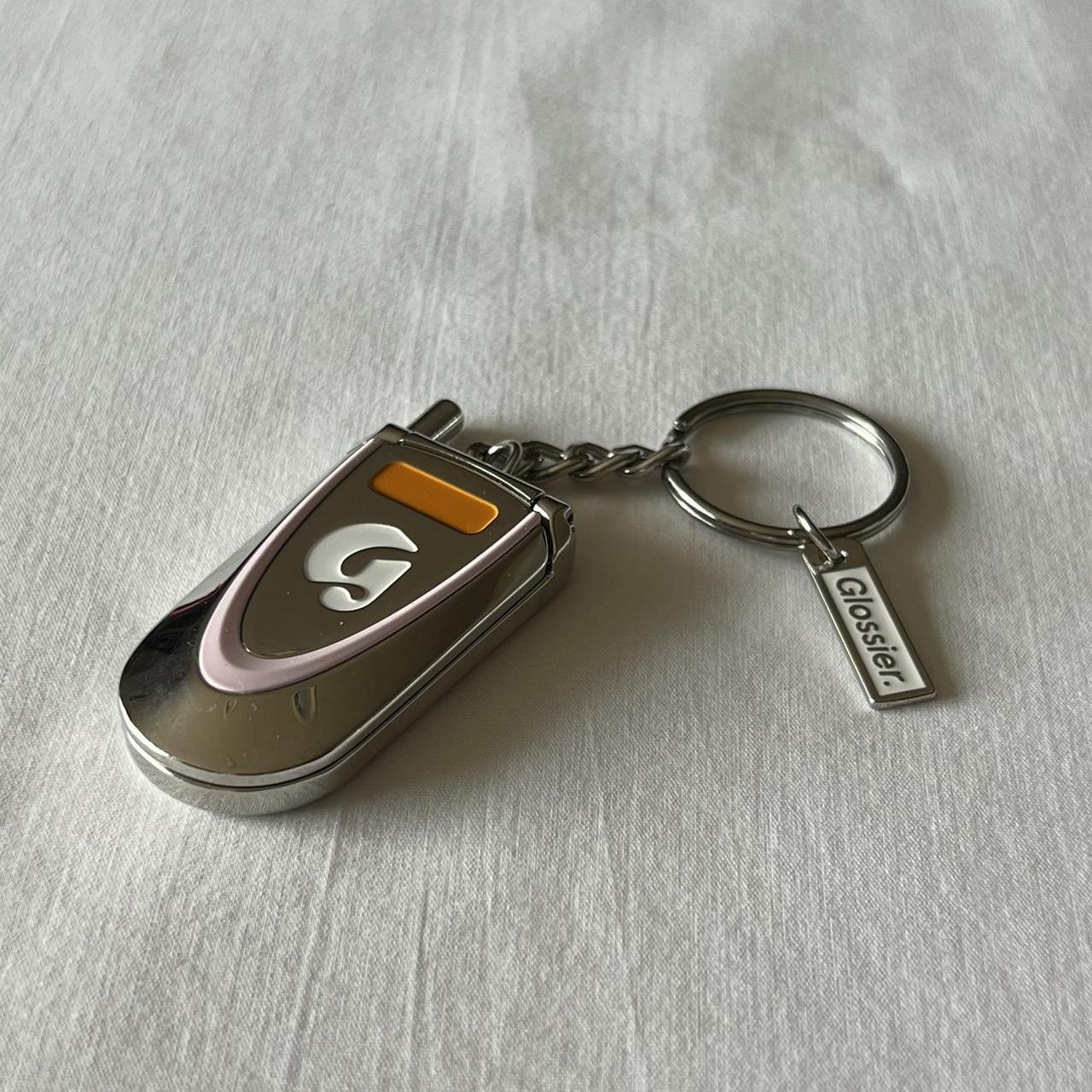 Glossier Los Angeles exclusive keychain ~ Clear seal... - Depop