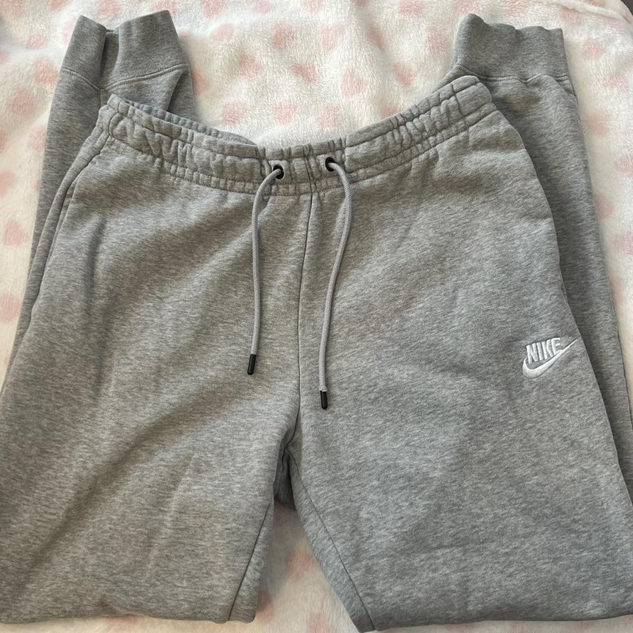 Grey Nike Sweatpants Size small Cuffed bottom... - Depop