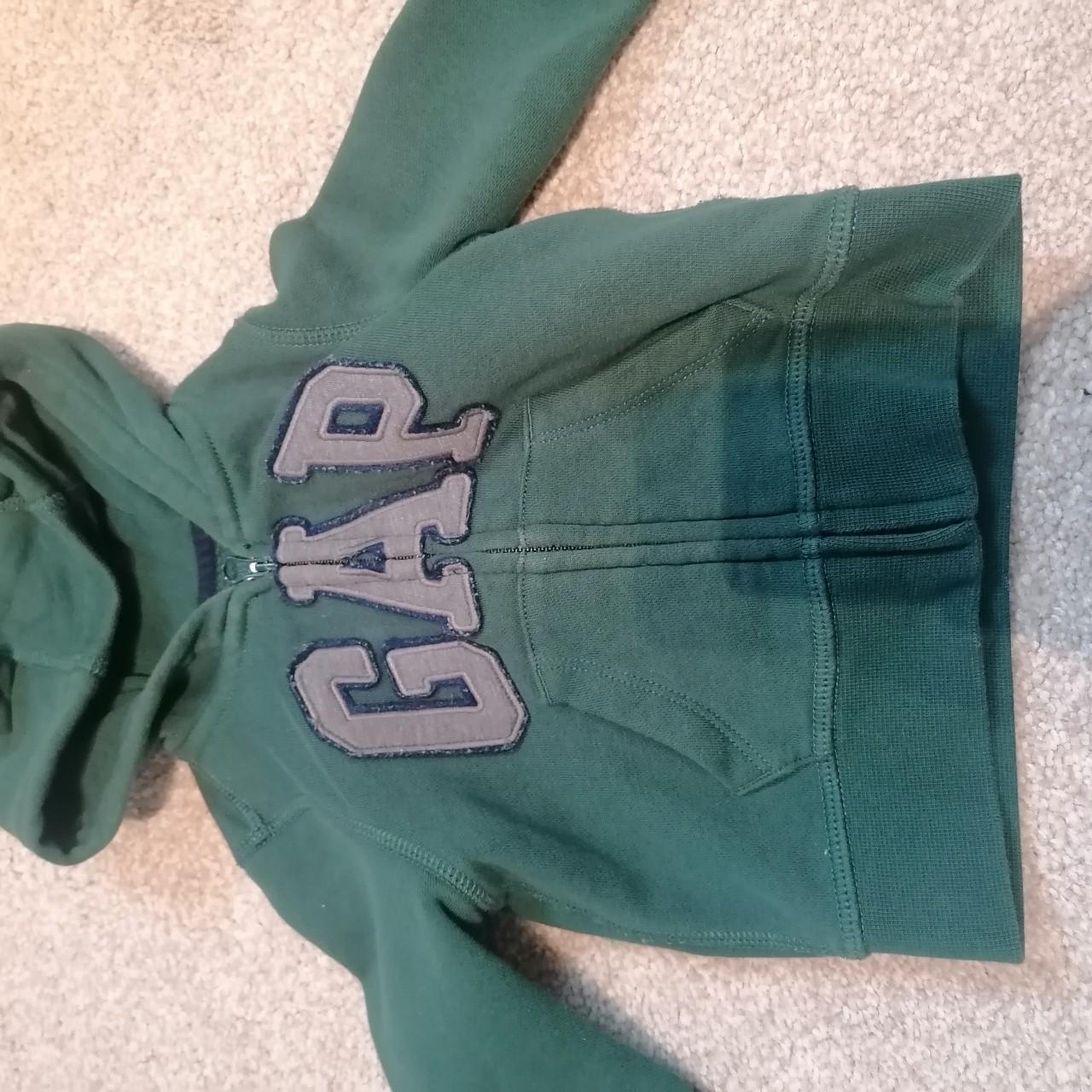 Green Gap zip up hoody. Size 6-12 months. Worn a few... - Depop