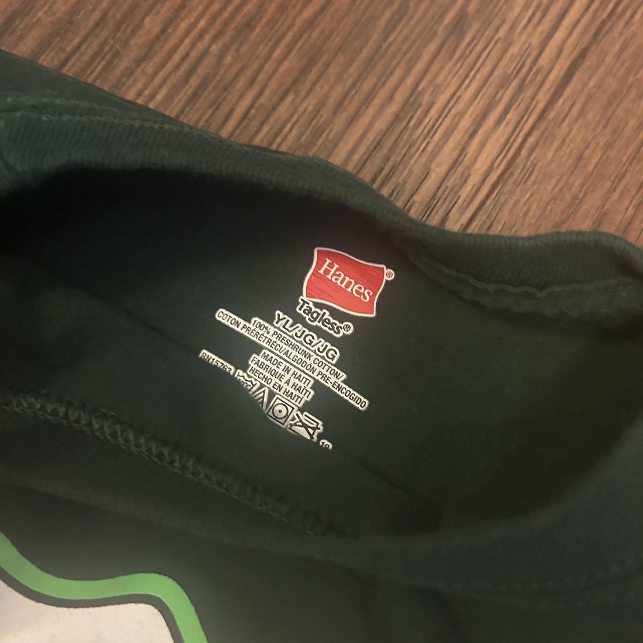 dark forest green T-rex Ranch graphic baby... - Depop