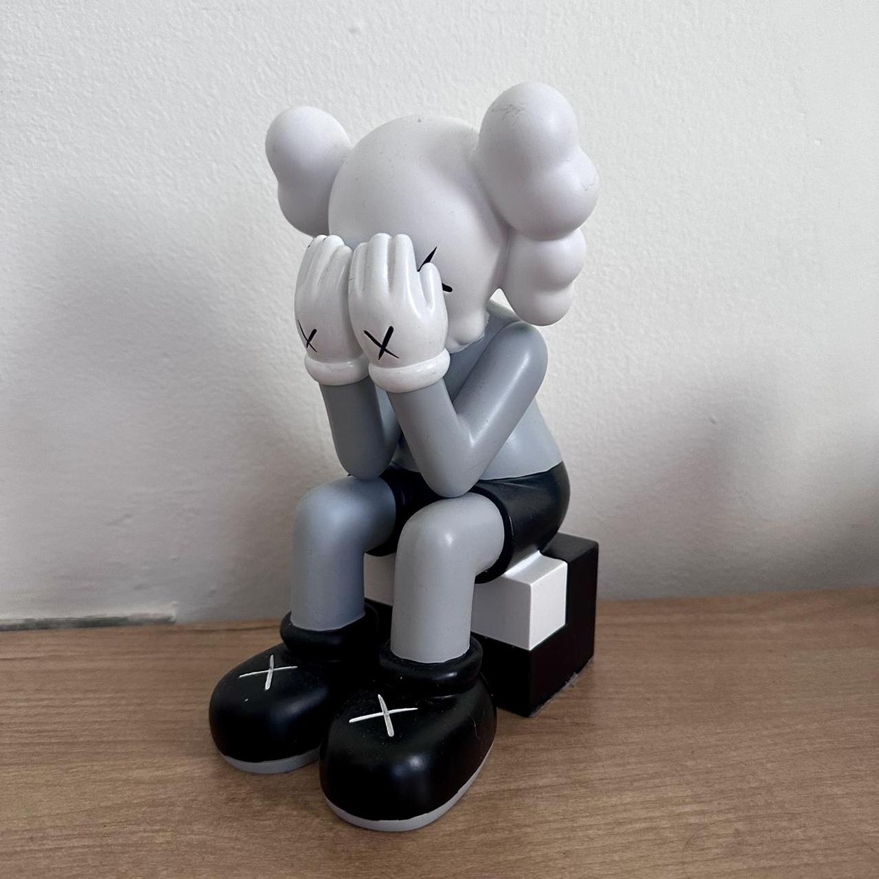 KAWS grey and white figure. About 9 inches tall.... - Depop