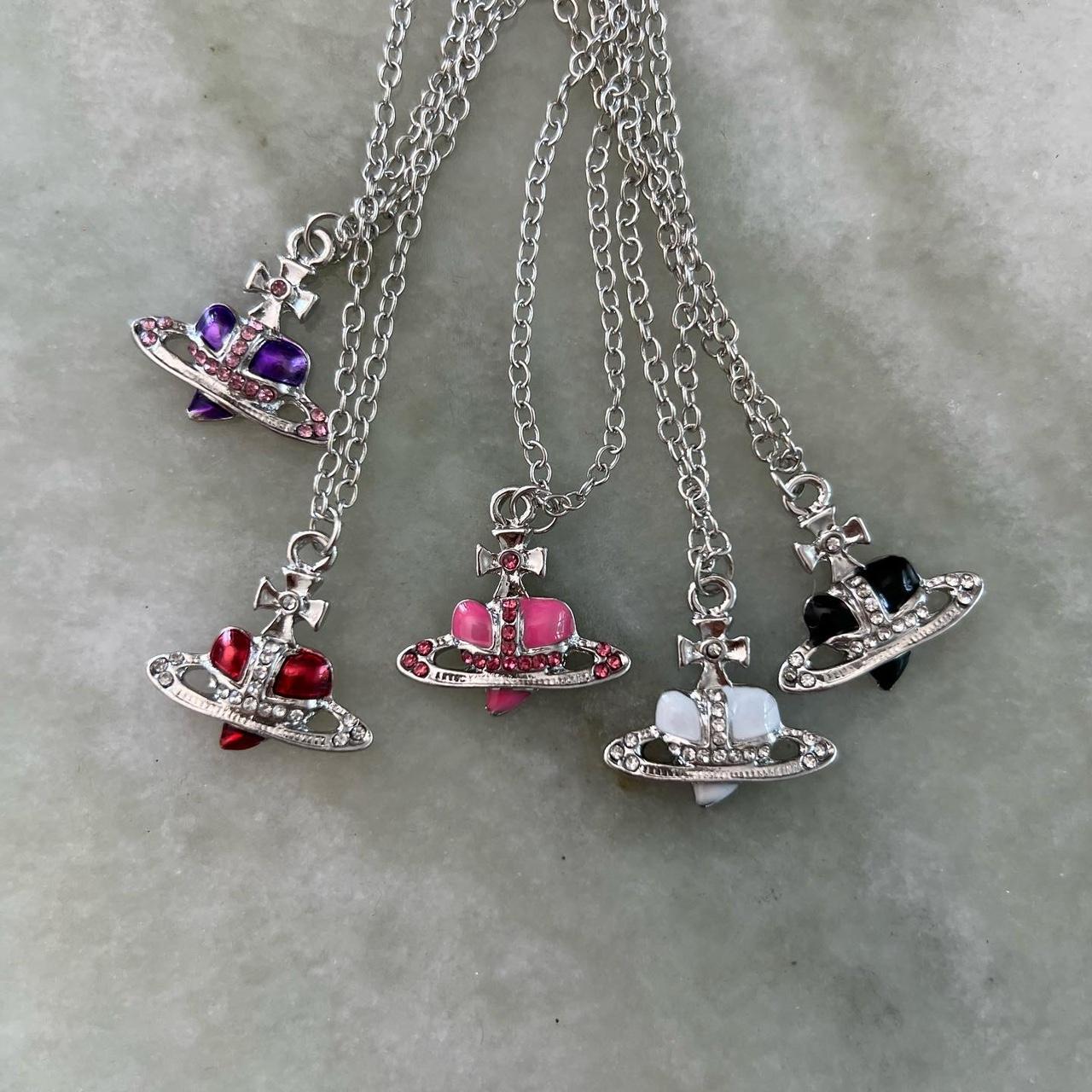 saturn orb heart chain necklaces in different... - Depop