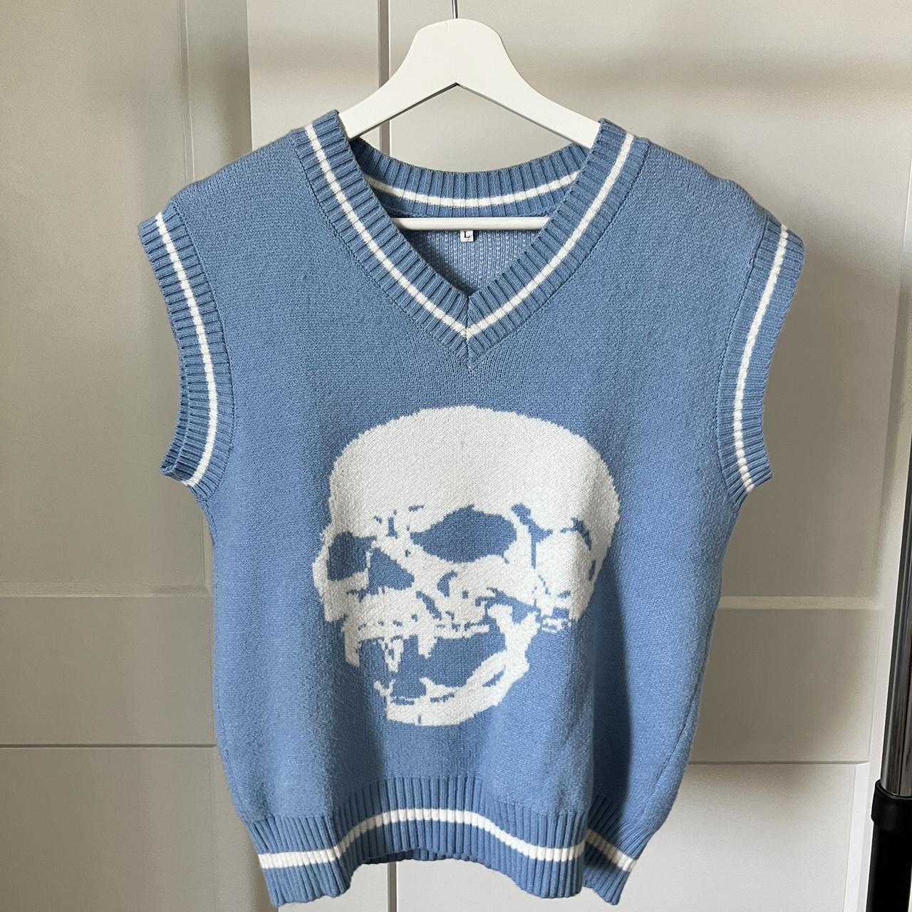 light blue sweater vest with white skull on front,... - Depop