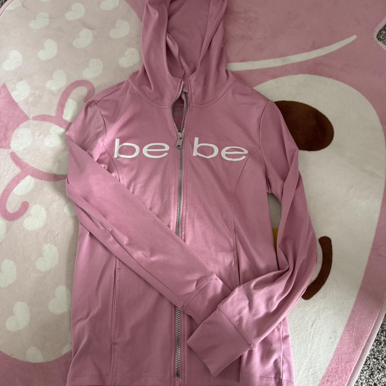 Pink Bebe zip up hoodie little mark on the... - Depop