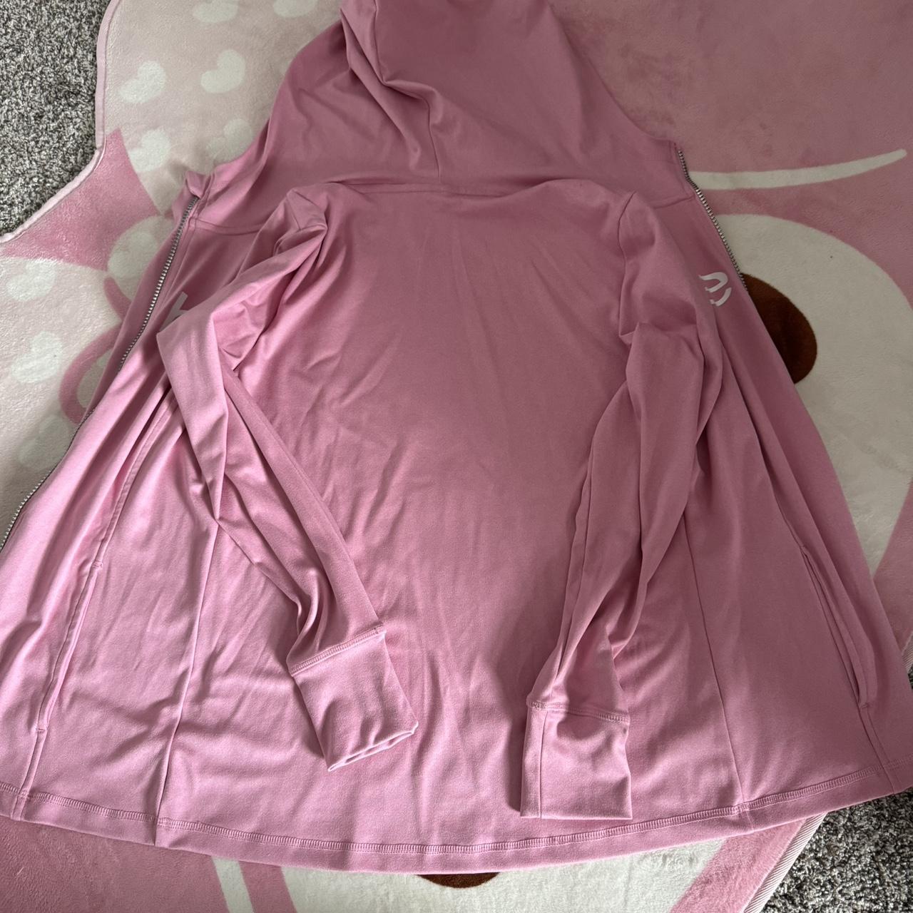 Pink Bebe zip up hoodie little mark on the... - Depop