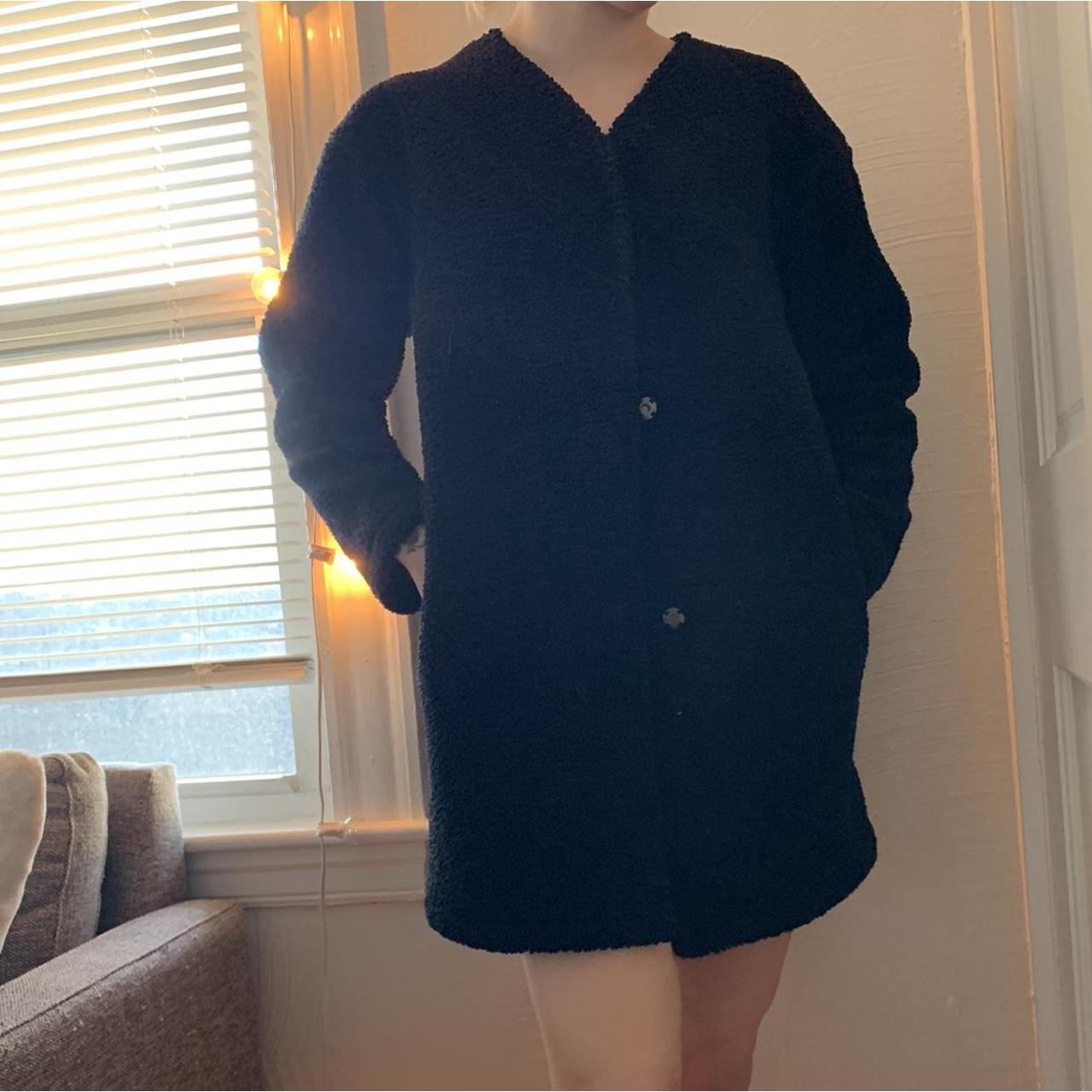 Fuzzy black uniqlo jacket with buttons. Warm and... - Depop