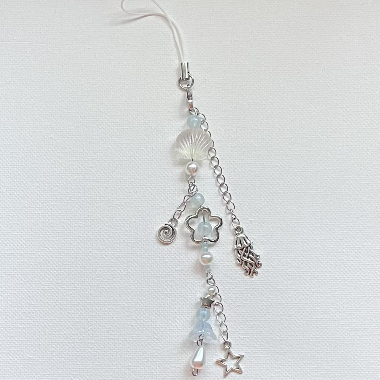 blue ocean phone charm! °｡ ⋆⸜ 🎧 handle with care... - Depop