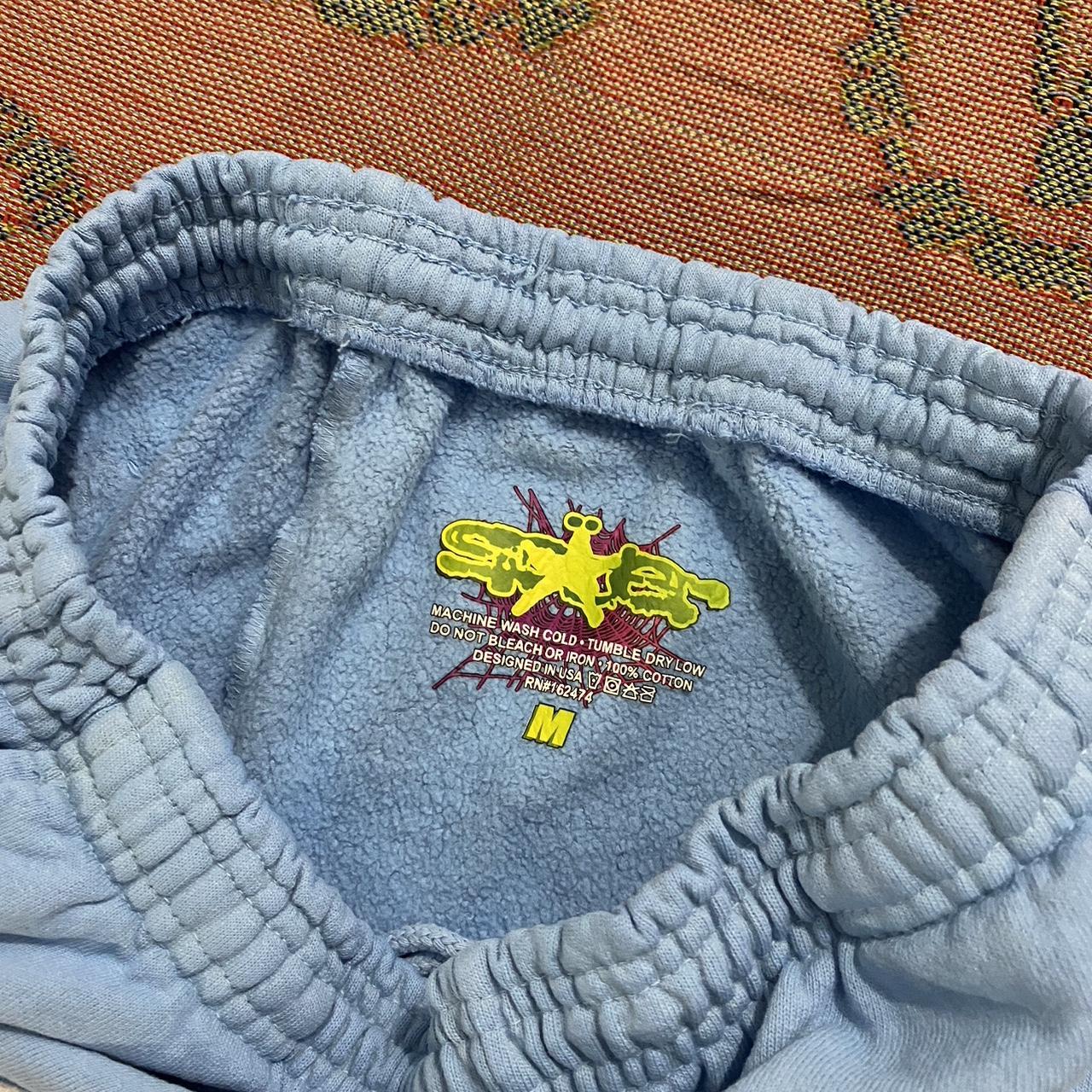 Sp5der ~ spider worldwide sky blue sweat pants from... - Depop