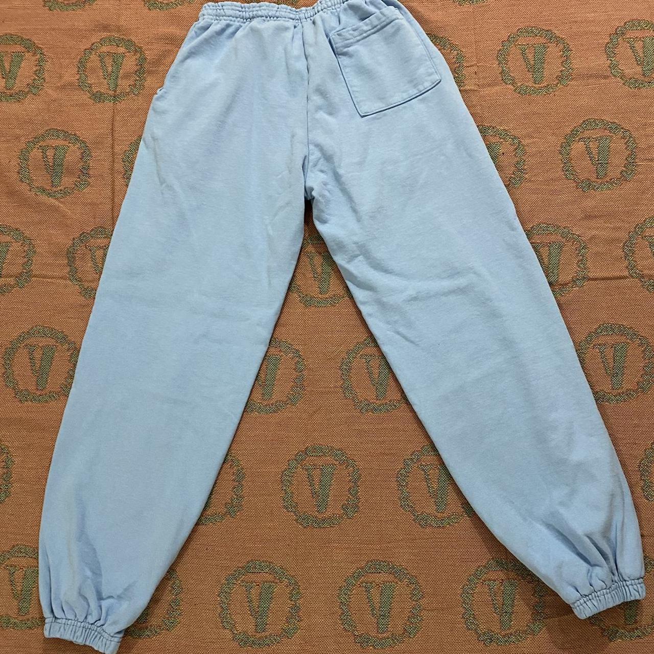 Sp5der ~ spider worldwide sky blue sweat pants from... - Depop