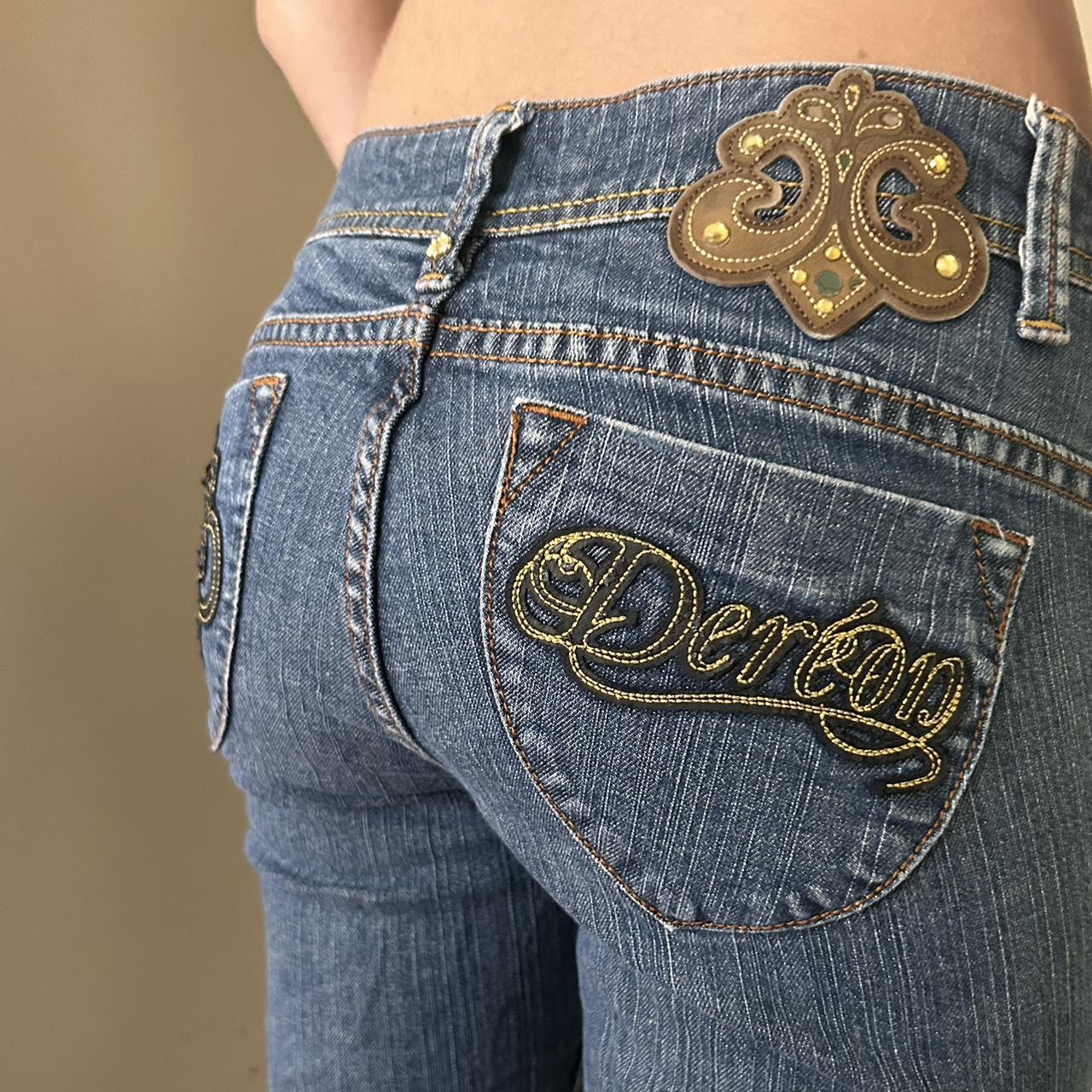 Dereon low rise bootcut jeans with embroidered logo... - Depop