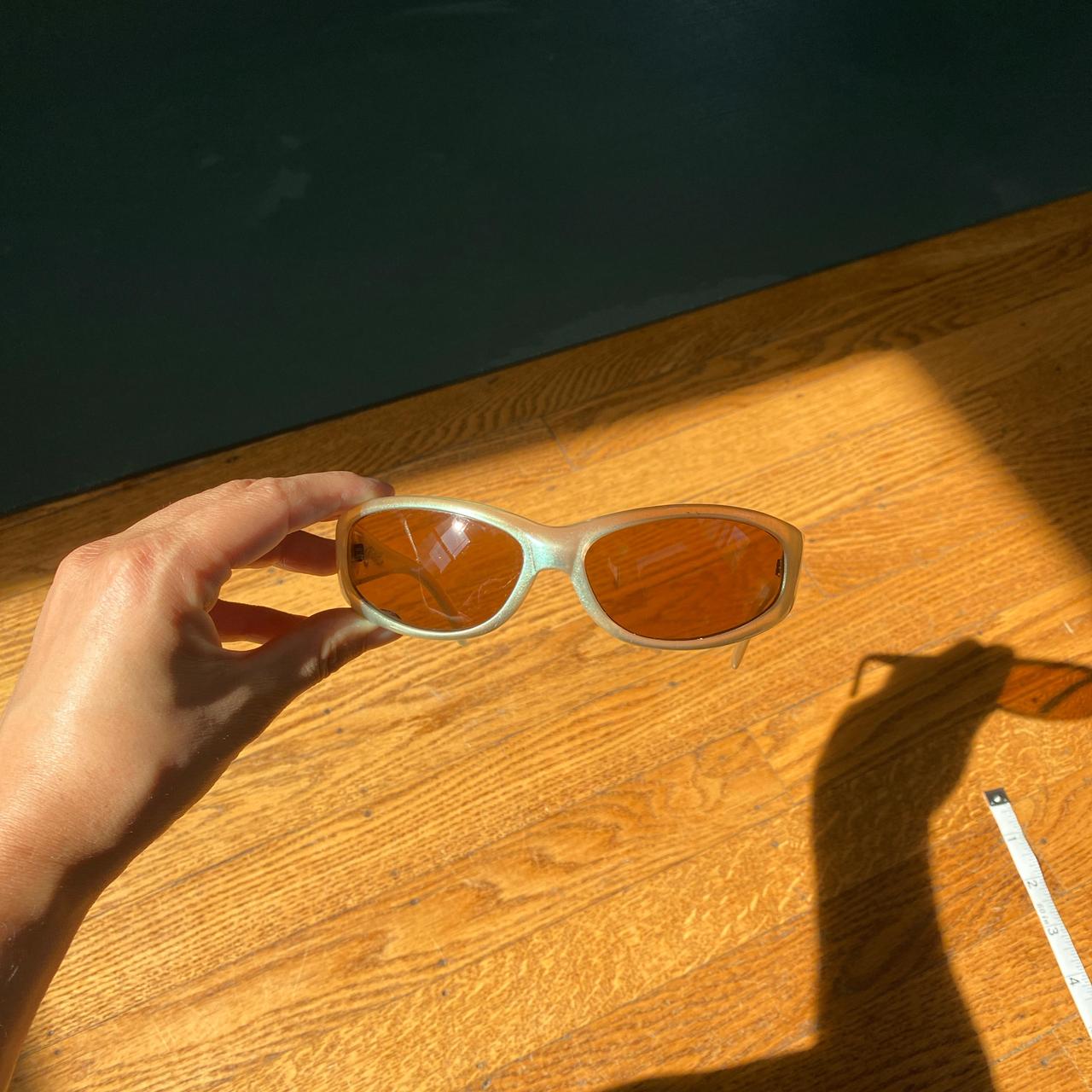 TRUE VINTAGE ARNETTE CATFISH WRAP ALIEN SHEILD... | Depop