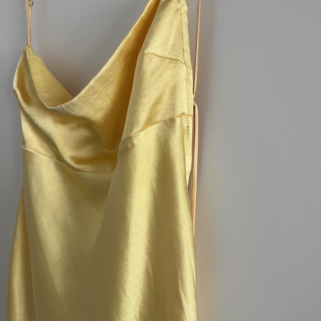 Yellow backless mini dress - silk Never worn... - Depop
