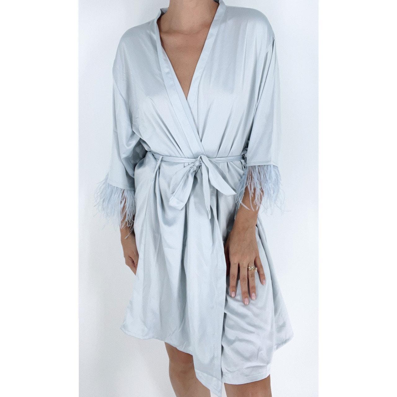 Feather robes are perfect to celebrate any occasion.... - Depop