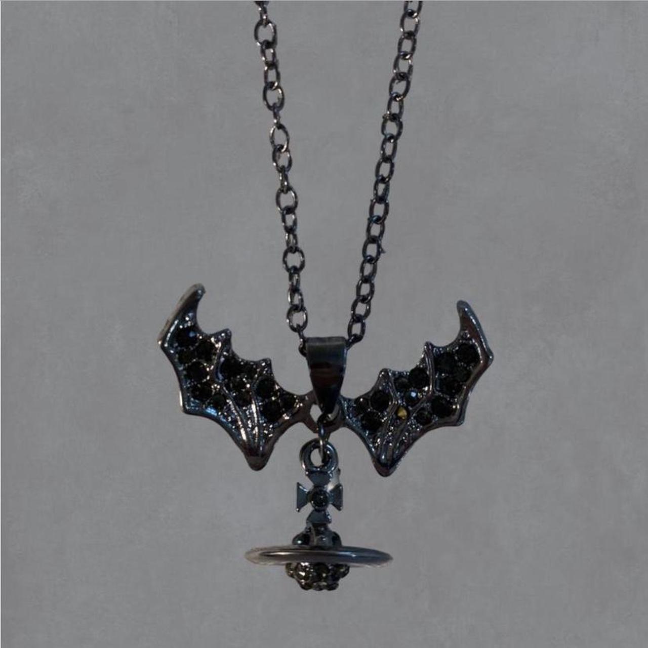 Vivienne Westwood black bat necklace adorned with... - Depop