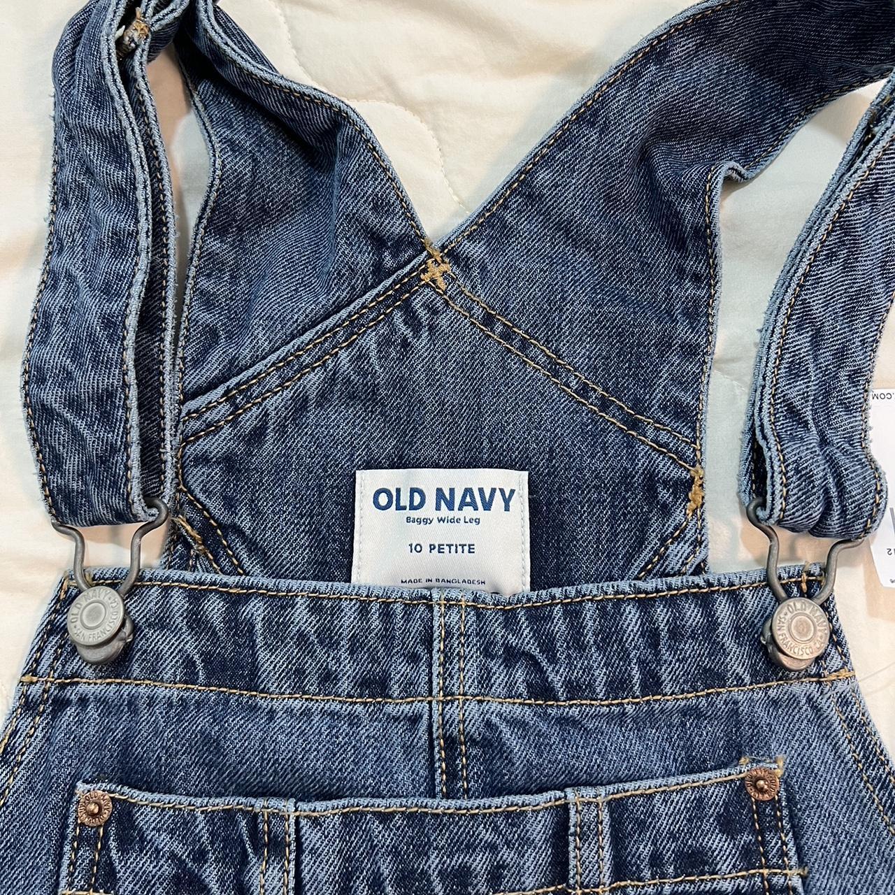 dark denim overalls with rips on the... - Depop