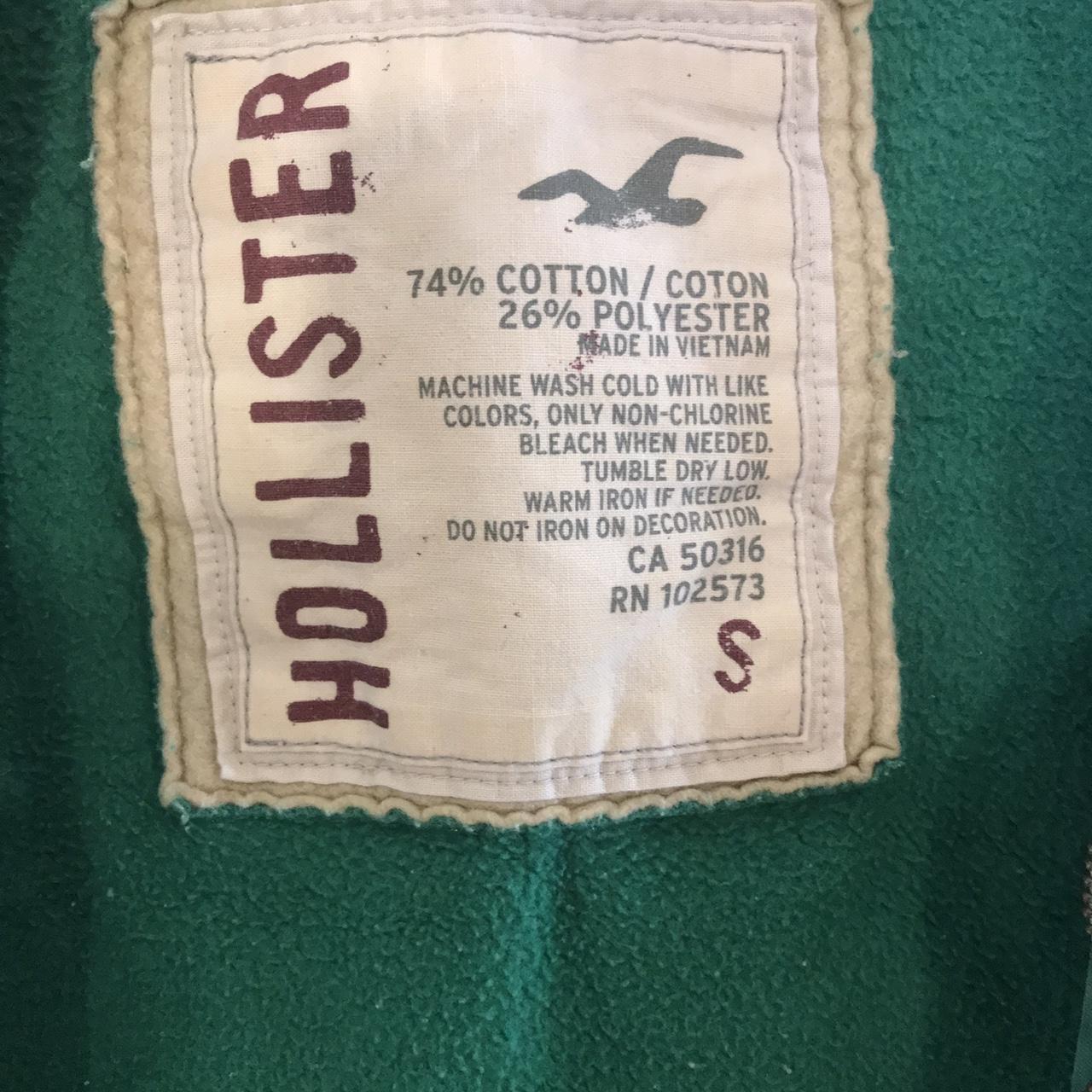 small y2k green hollister zip up hoodie has ‘22’... - Depop